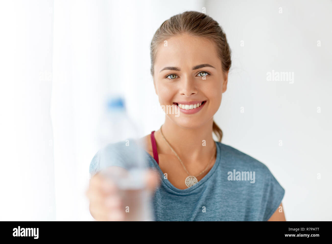 Woman with bottle hi-res stock photography and images - Alamy