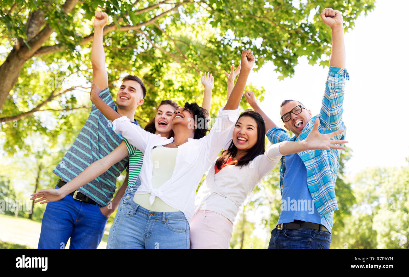 group of happy smiling friends having fun outdoors Stock Photo - Alamy