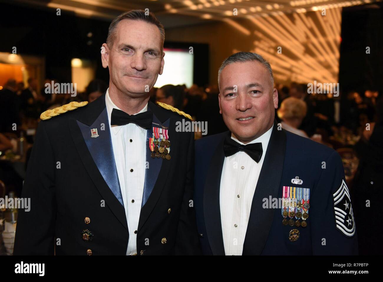 Air Force Chief Master Sgt. Mitchell Brush, right, senior enlisted ...