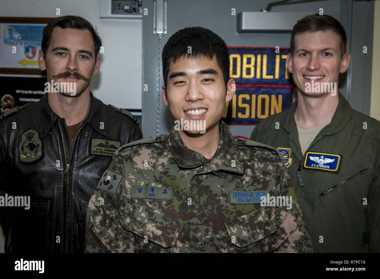 Royal Australian Air Force Flt. Lt. Kyle Hornberg, left, Republic of ...