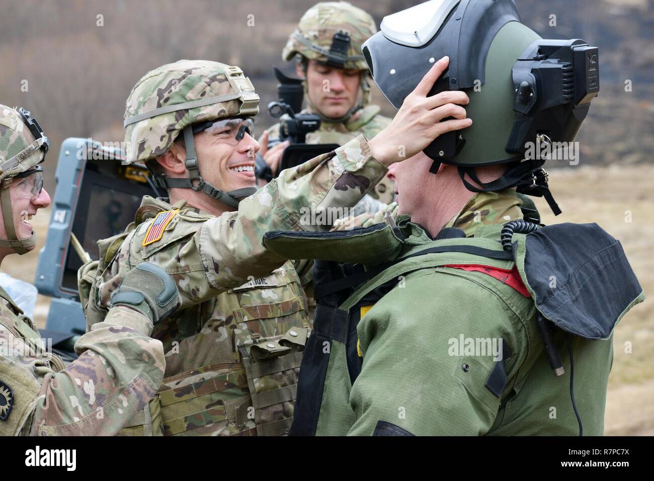 U.S. Army soldiers, assigned to the 16th Sustainment Brigade, assist ...