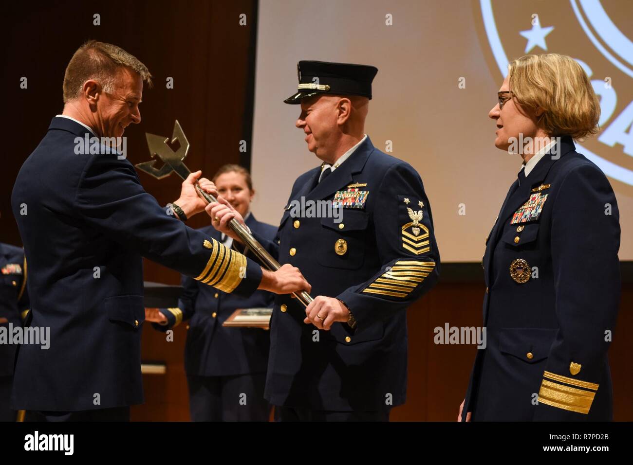 Commandant of the Coast Guard, Admiral Paul Zukunft, presents Master ...