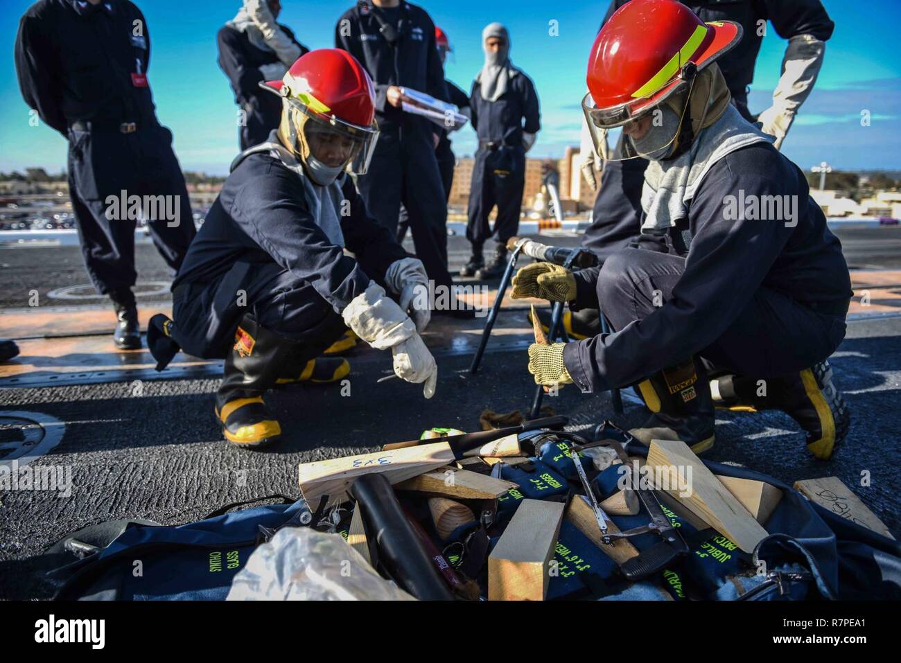 SAN DIEGO (Mar. 21, 2017) Sailors practice pipe patching with a wedge ...