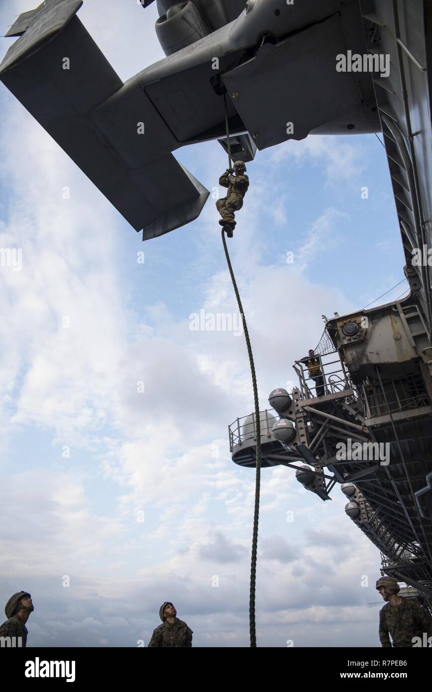 PHILIPPINE SEA (March 21, 2017) Marines, assigned to Battalion Landing ...