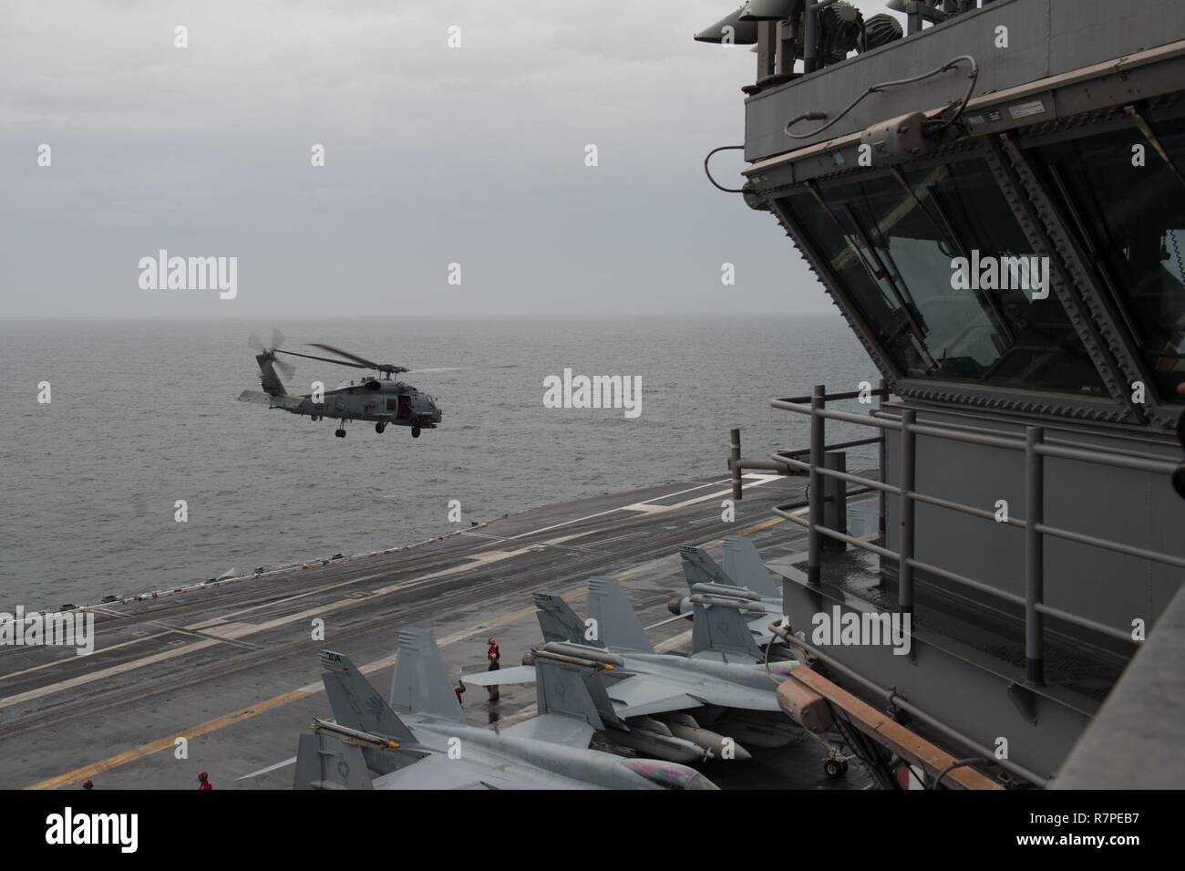 U.S. 5TH FLEET AREA OF OPERATIONS (March 21, 2017) An MH-60R Sea Hawk ...