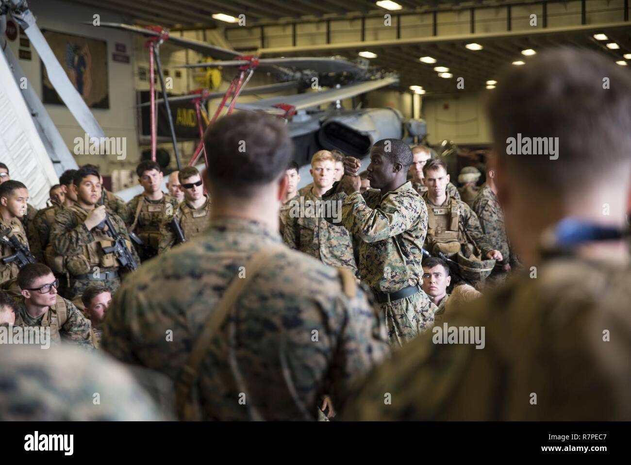 PHILIPPINE SEA (March 21, 2017) Capt. Emmanuel Gordon, center, from ...