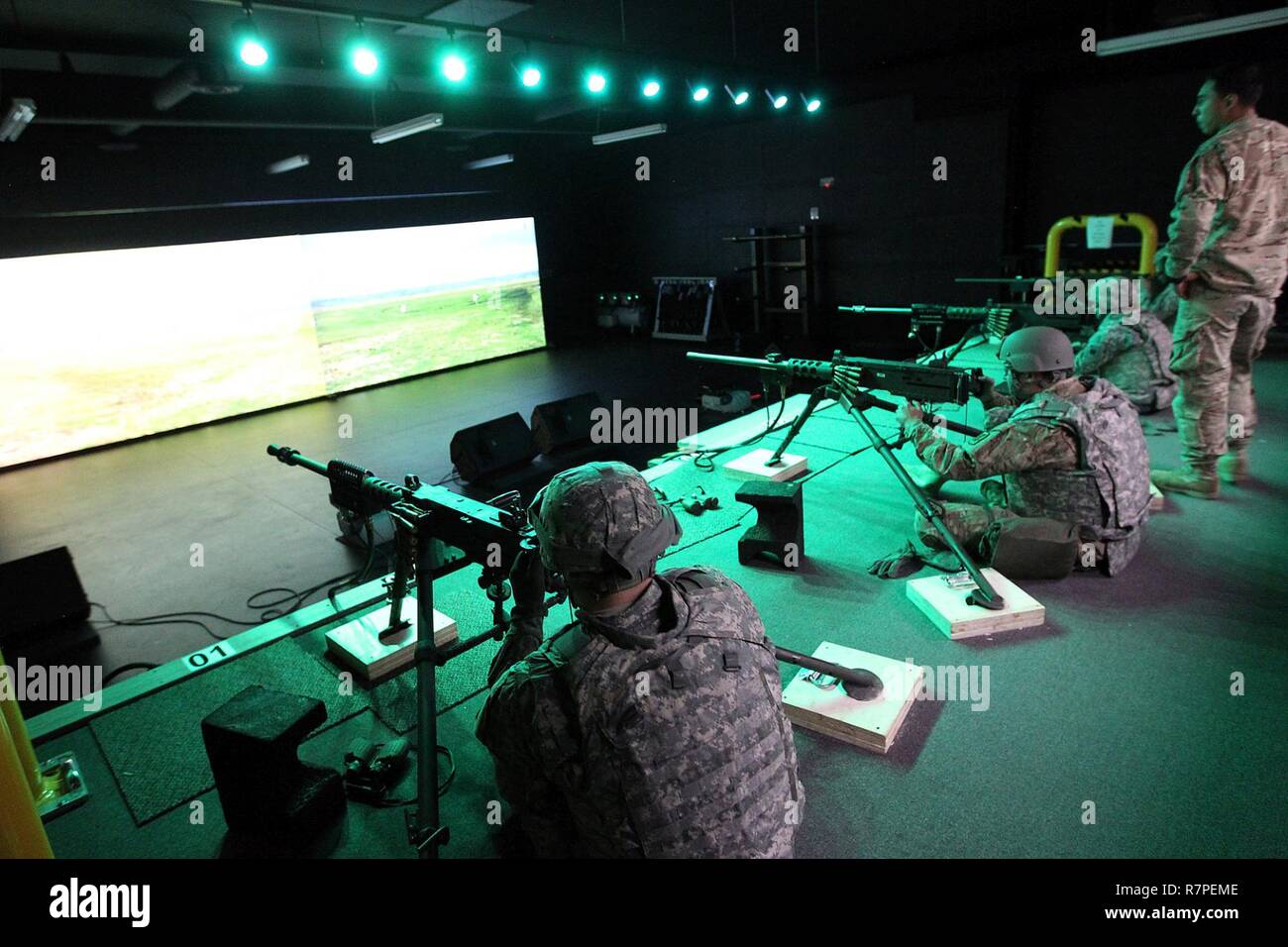 U.S. Army Reserve gunnery crews train in an Engagement Skills Trainer ...