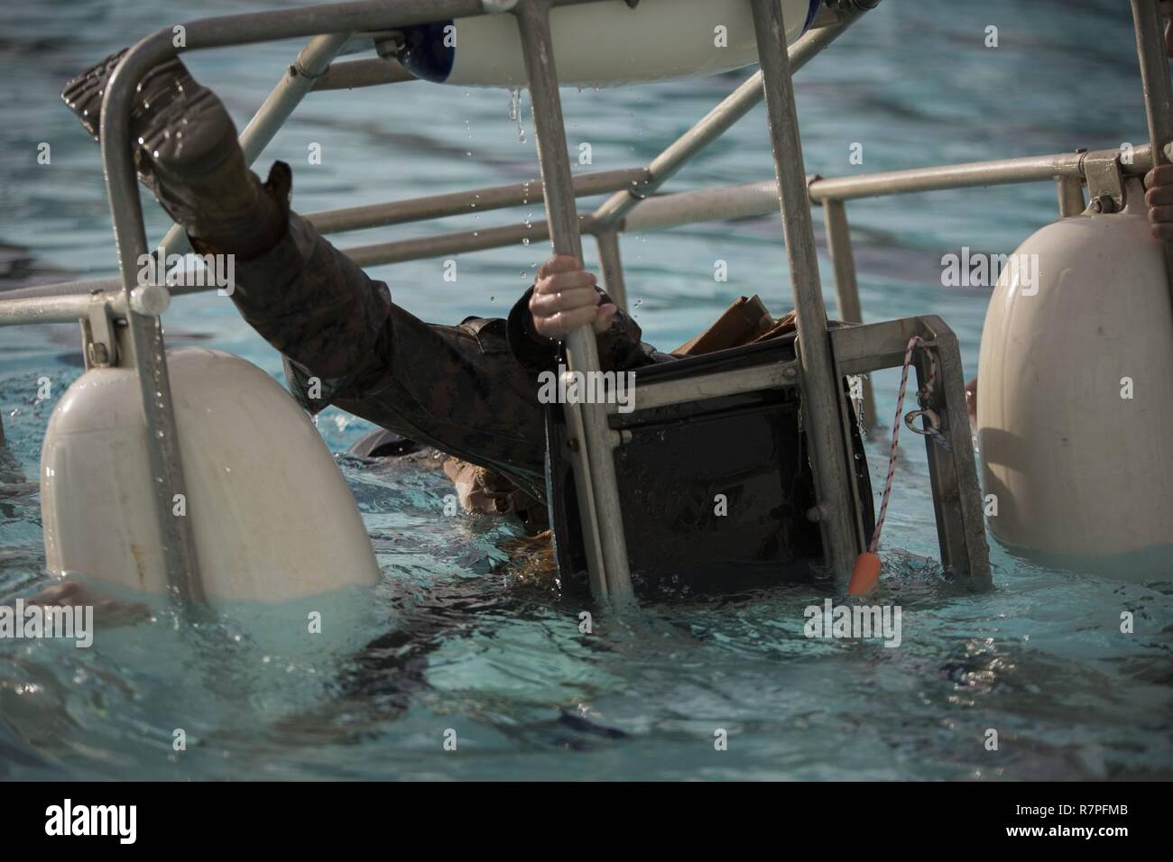 A Marine assigned to Bravo Company, 1st Battalion, 3rd Marine Regiment ...