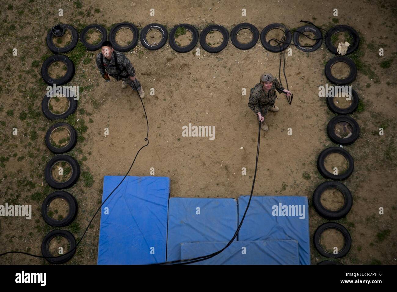 Republic of Korea Marine Gunnery Sgt. Myung Soo Lee (left), a platoon ...
