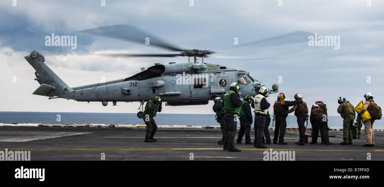 U.S. 7TH FLEET AREA OF OPERATIONS (March 24, 2017) An MH-60R Sea Hawk ...