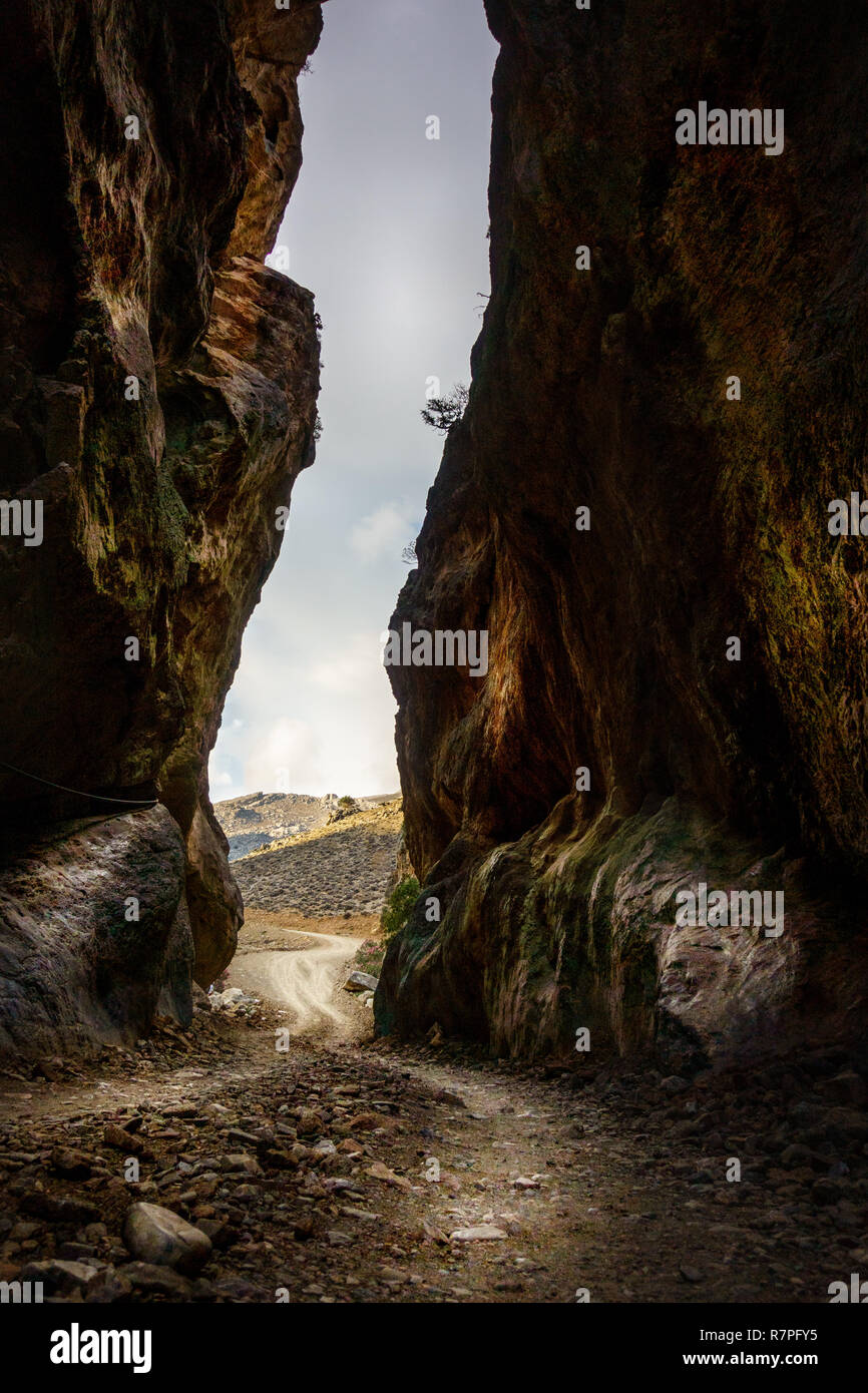 Road between cliff Stock Photo - Alamy