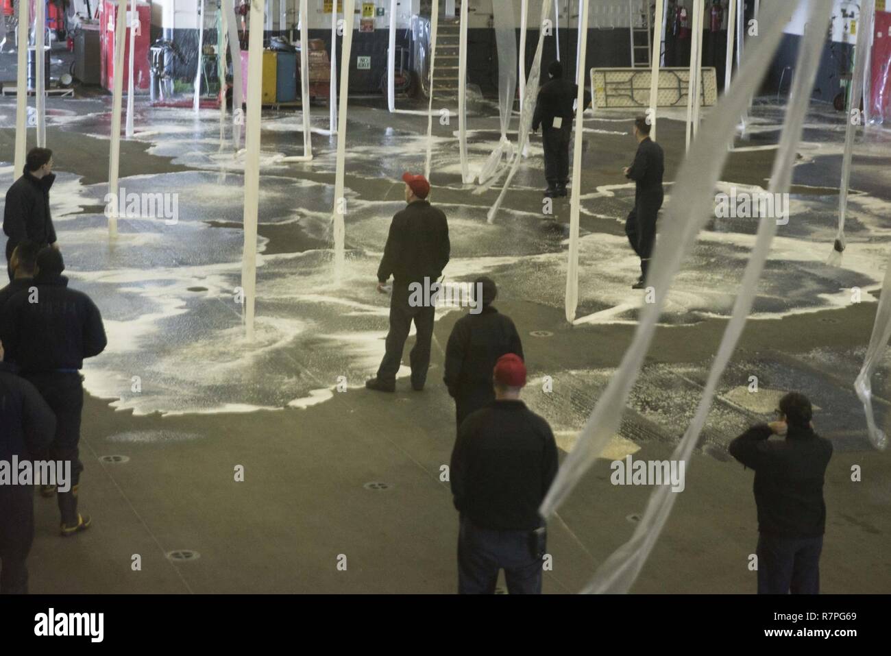 ATLANTIC OCEAN (March 23, 2017) Sailors observe an Aqueous Film Forming ...