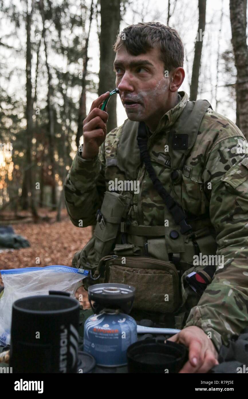 U.S. Army Capt. Mike Belina of Headquarters and Headquarters Company ...