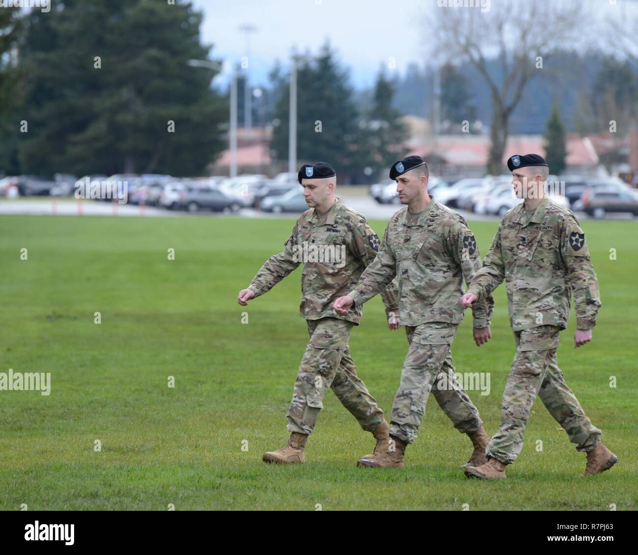 COL David C. Foley, 1-2 Stryker Brigade commander (center) walks with ...