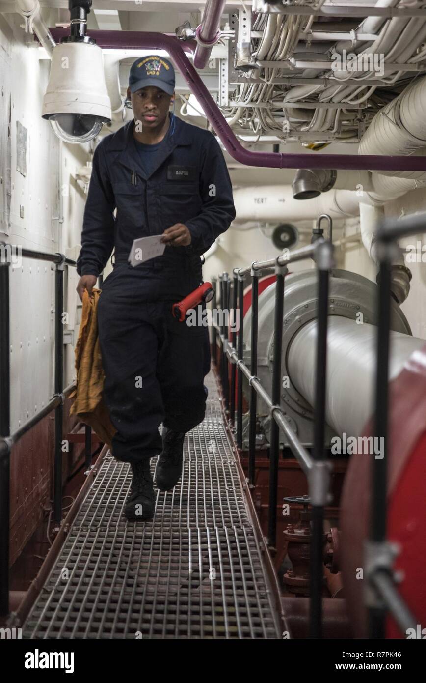 PHILIPPINE SEA (March 26, 2017) Machinist's Mate Fireman Michael Okray ...