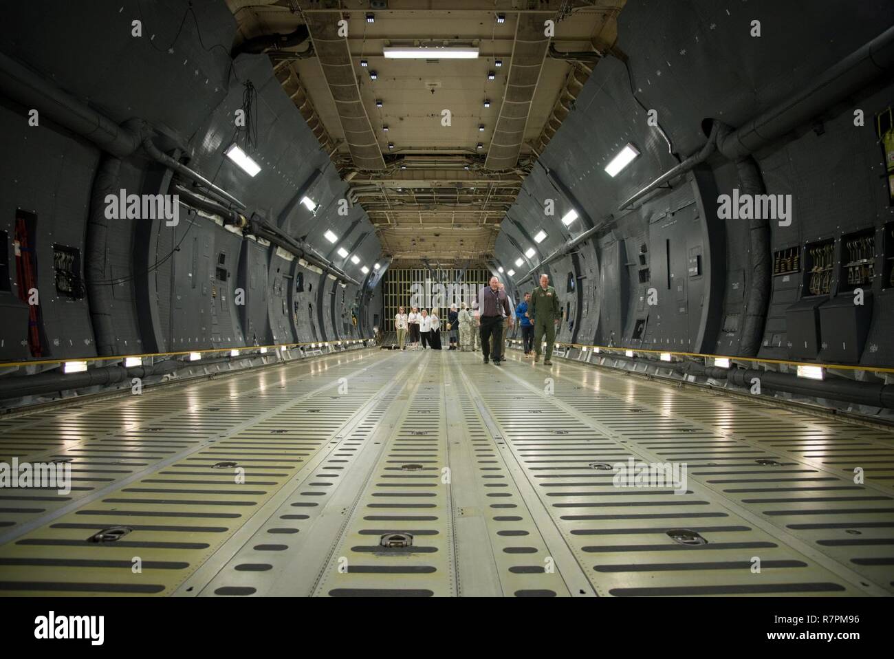 Civic leaders from the Gulf Coast tour the inside of a C-5M Super ...