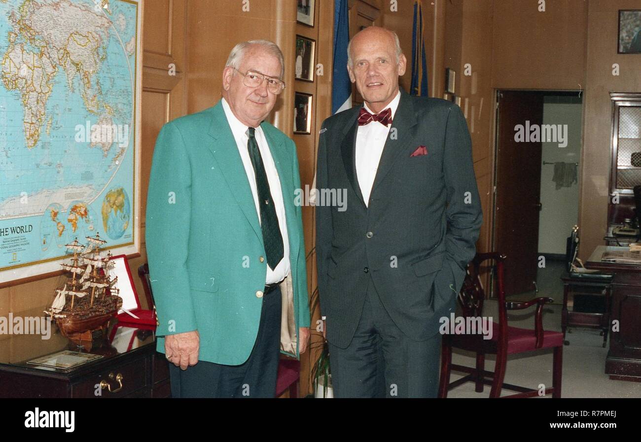TWO MEN STANDING NEXT TO EACH OTHER TAKING A PHOTO SHOUT Stock Photo ...