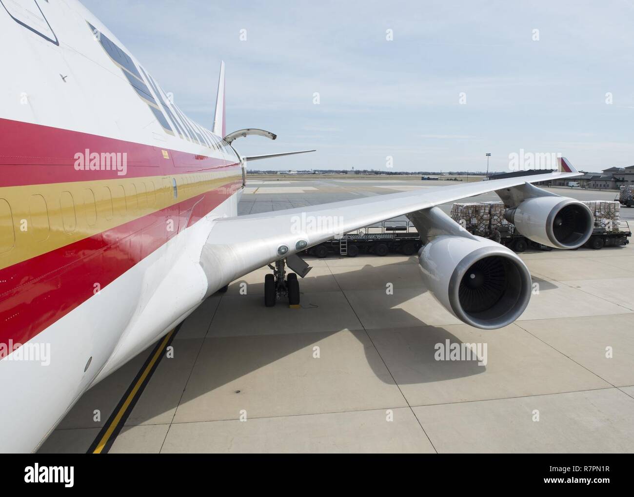 Airmen from the 436th Aerial Port Squadron load cargo onto a Kalitta ...
