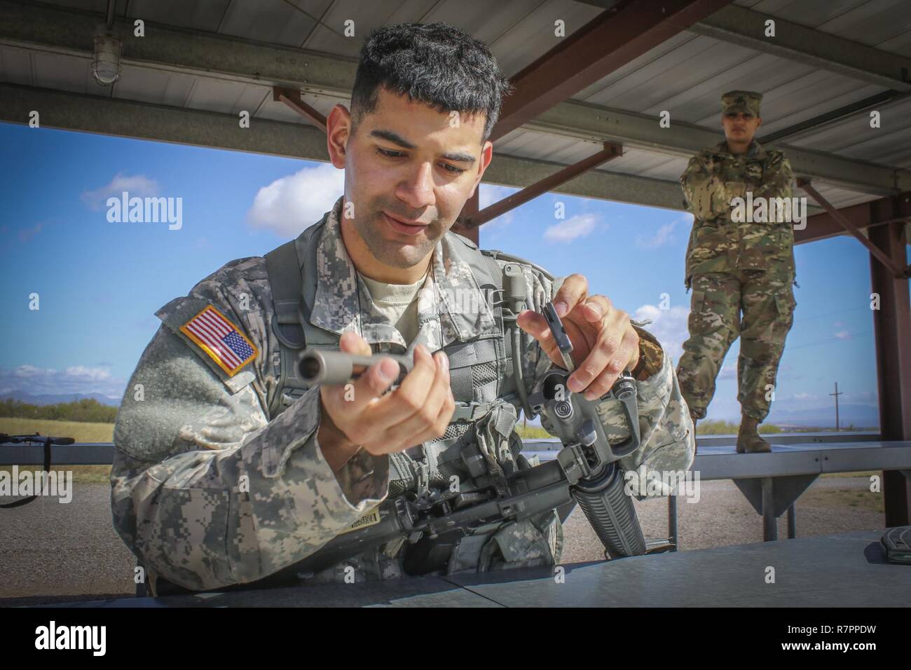 Army Reserve Sgt. Alexandro Magana, a cable systems installer ...