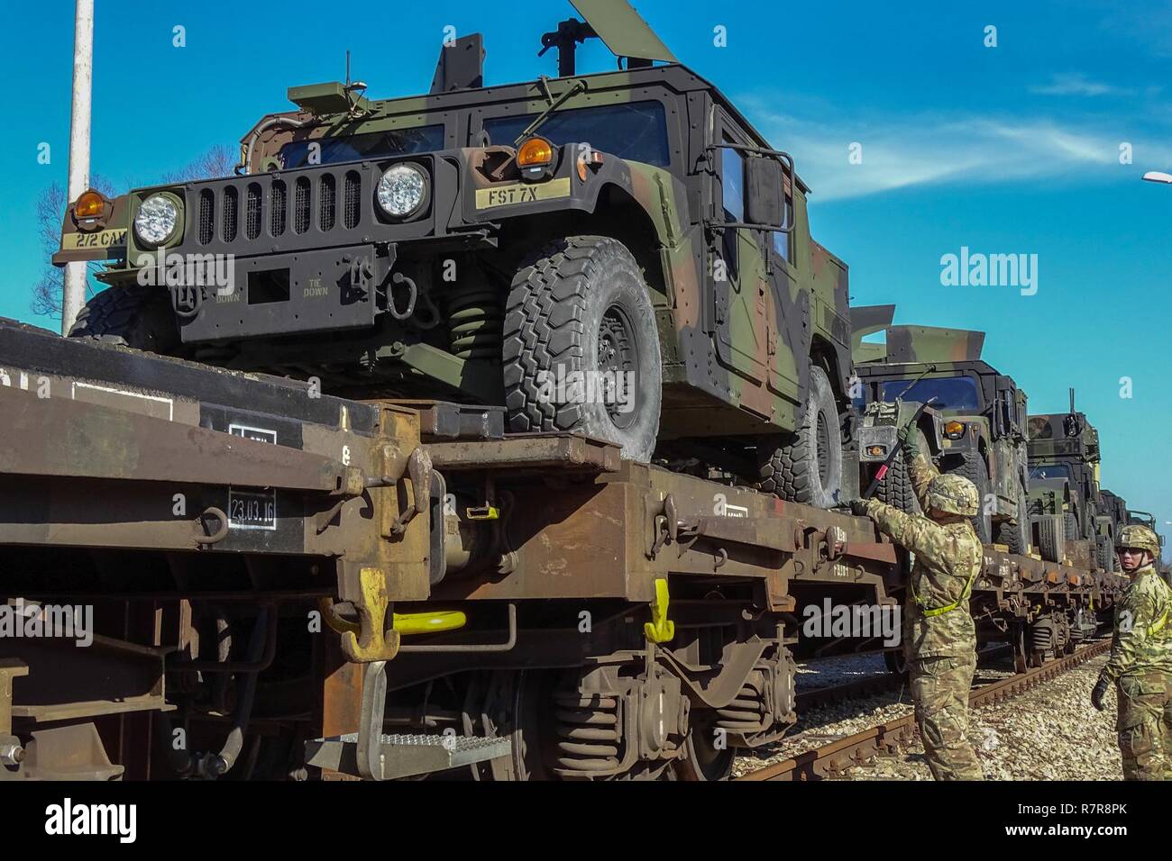 U.S. Soldiers from the 2nd Stryker Cavalry Regiment Battle Group unload ...