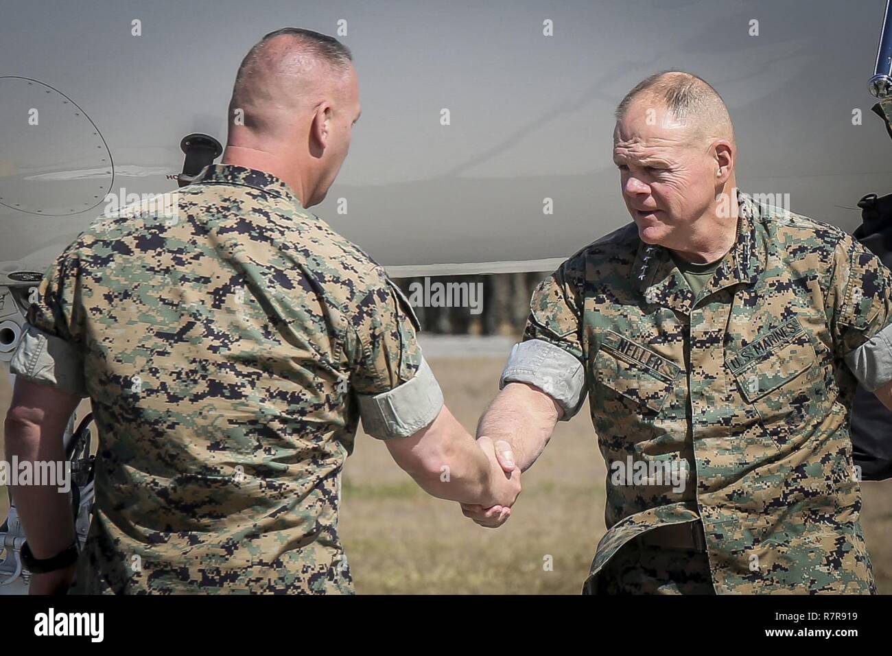Col. Peter D. Buck greets Gen. Robert B. Neller, the 37th Commandant of ...