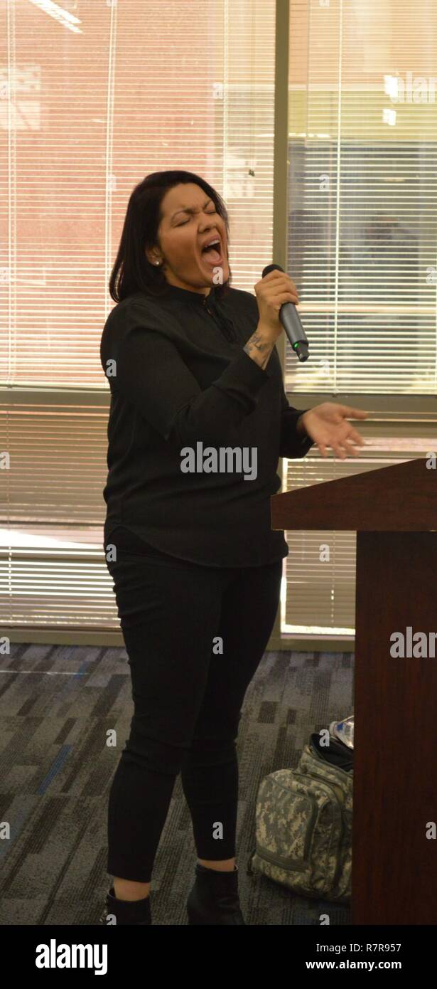 Victoria Faris, a GlobalTranz employee, sings a version of the ‘Star ...