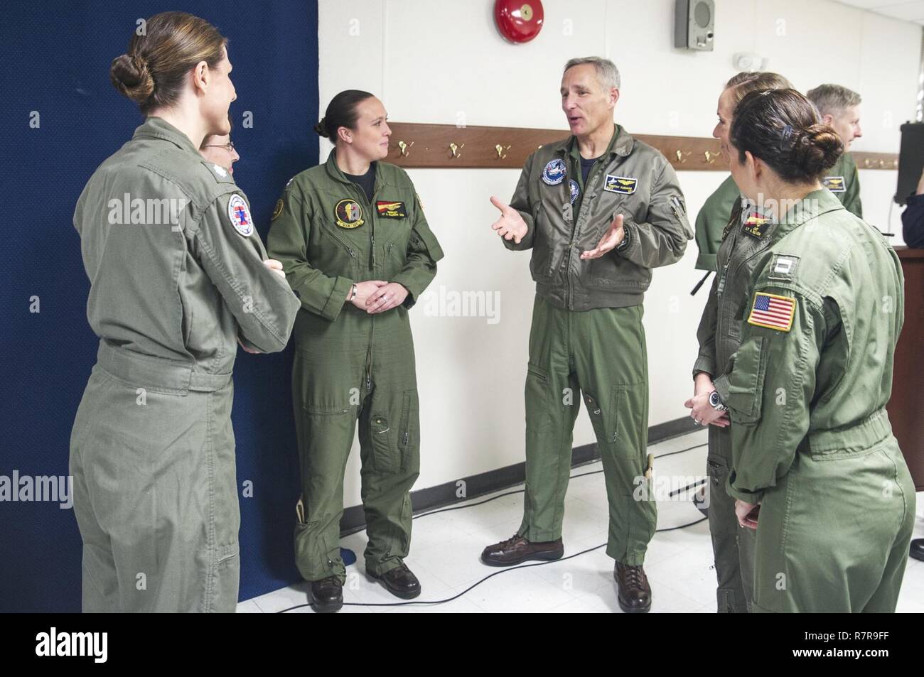 NORFOLK (March 29, 2017) Capt. Timothy Kuehhas, center, the commanding ...