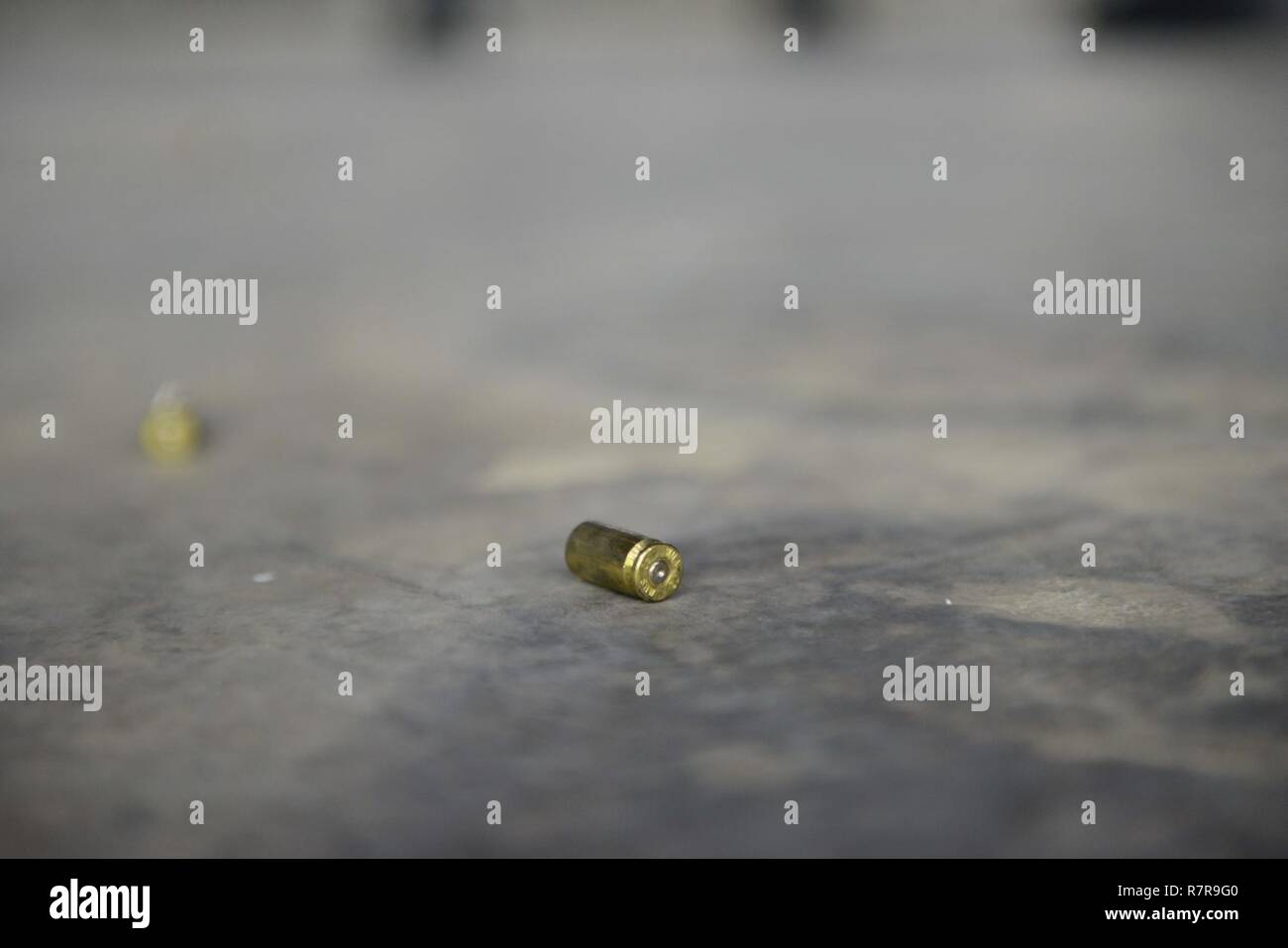 A Sig Sauer P229R DAK pistol casing is shown during a Firearms Training ...