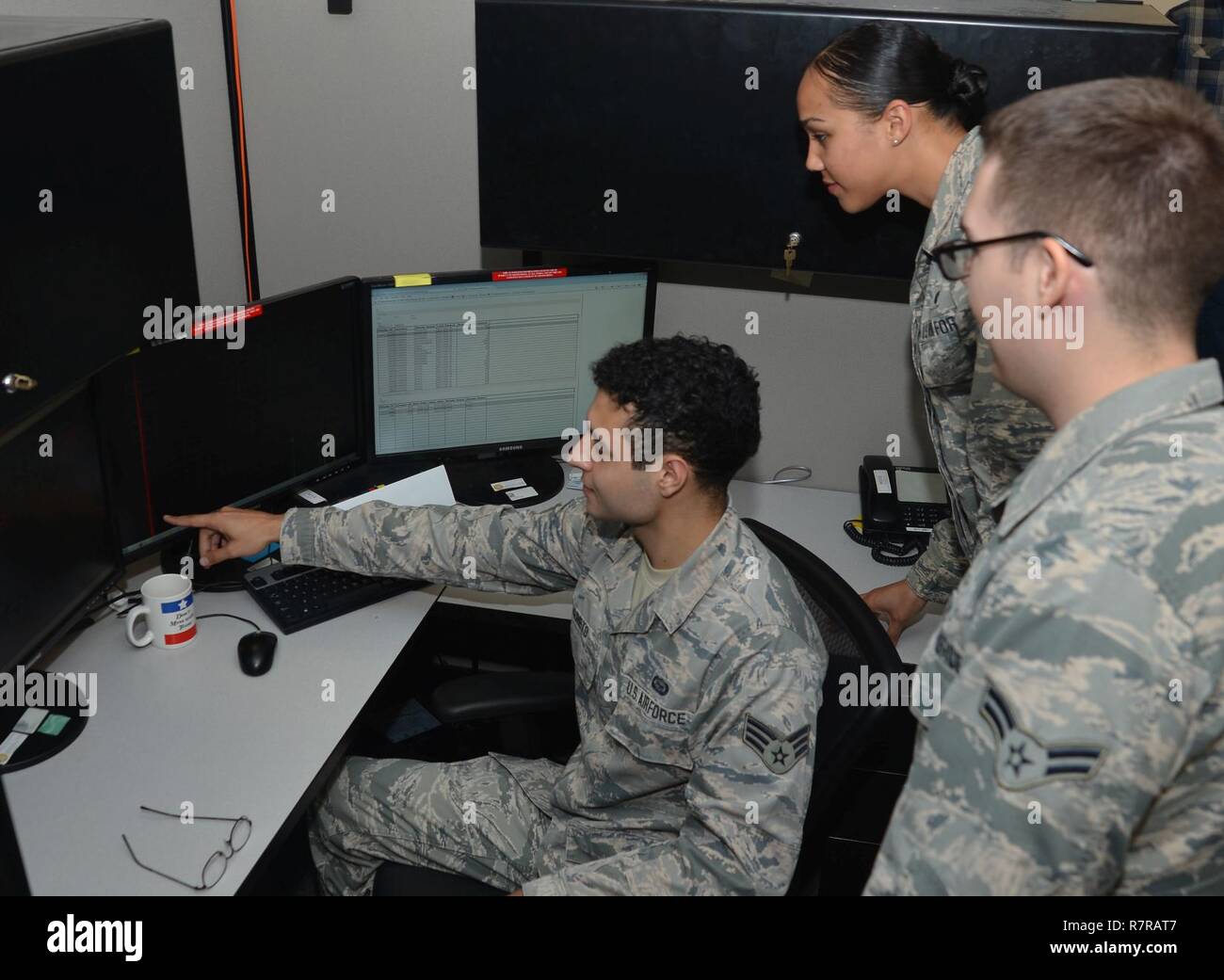 Analysts from the 453rd Electronic Warfare Squadron work on data-mining ...