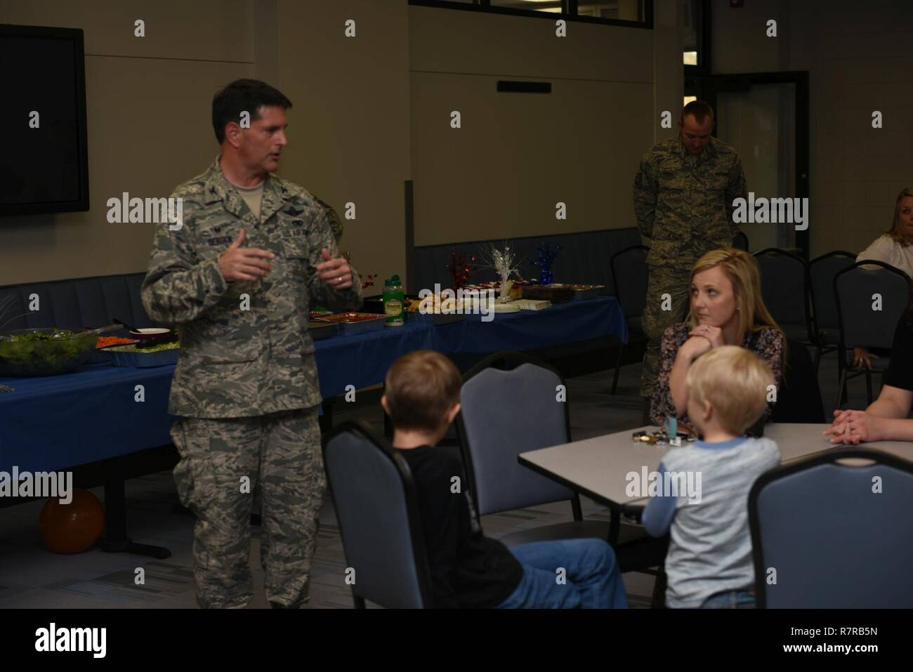 Air Force Colonel Michael T Gerock. addresses the family members of ...