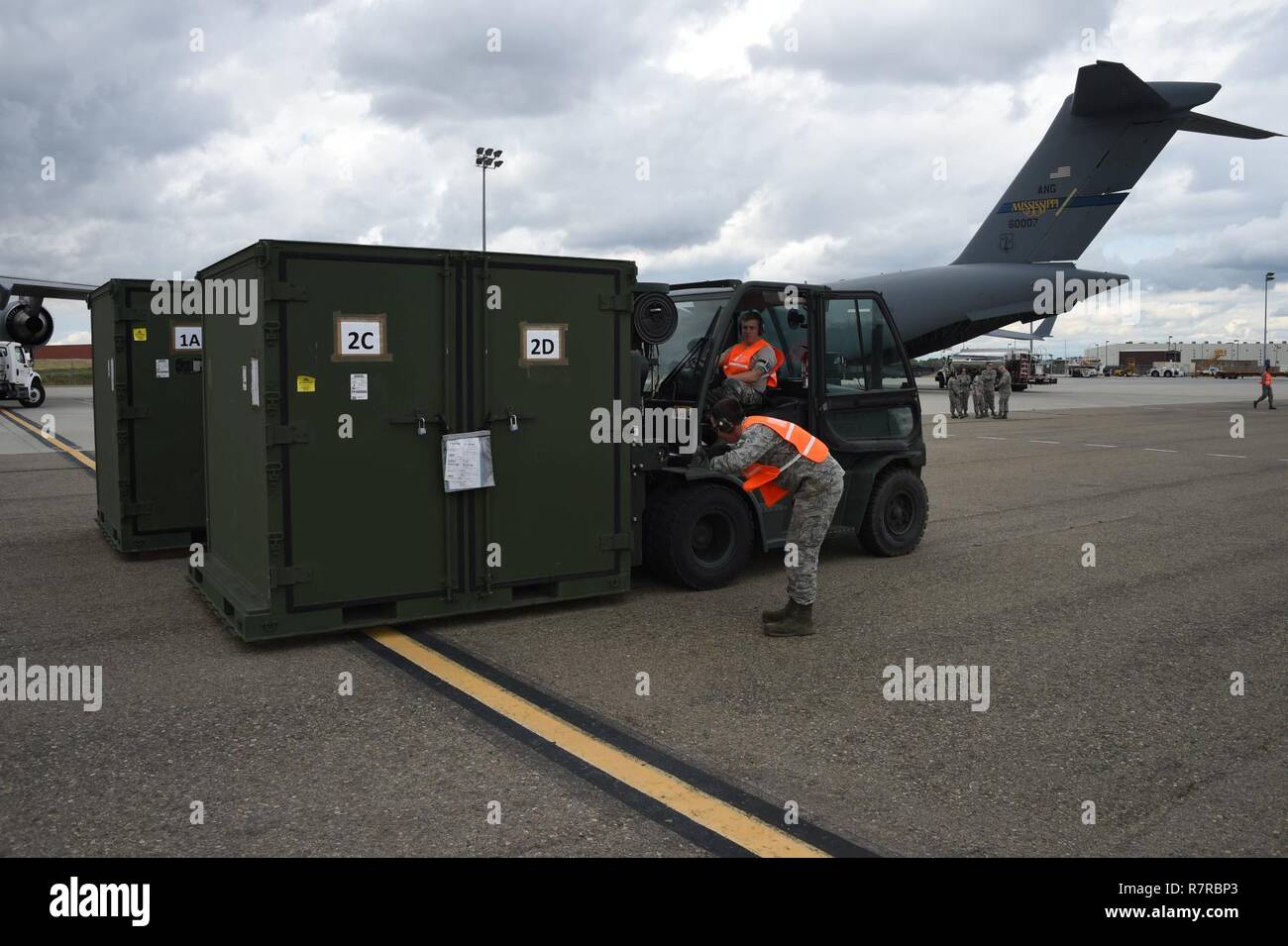 U.S. Air Force Senior Master Sgt. Eric Lieder (front) and Senior Airman ...