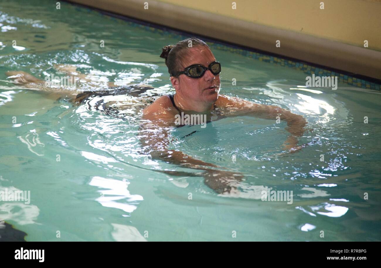 U.S. Army veteran, Christy Gardner, trains for the swimming event for ...