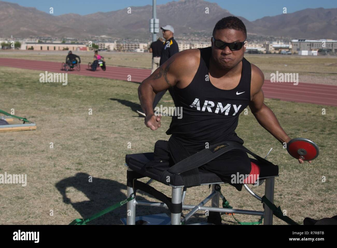 U.S. Army veteran, Ryan Major, trains for the sitting dicus event for ...