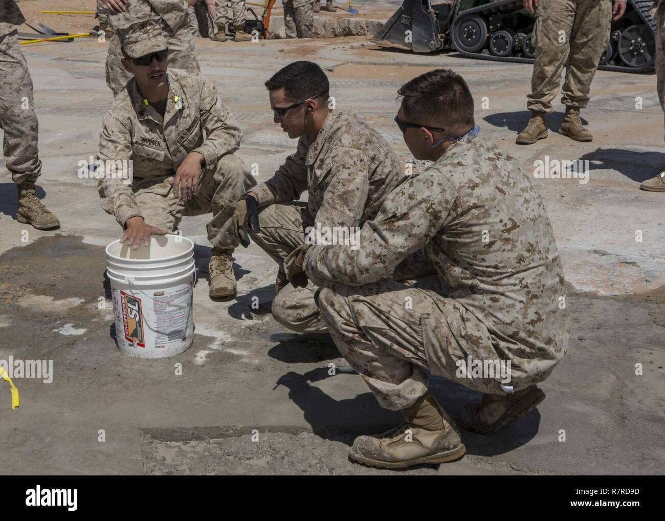 U.S. Marine Corps Sgt. Benjamin M. Moonen, combat engineer, instructs ...