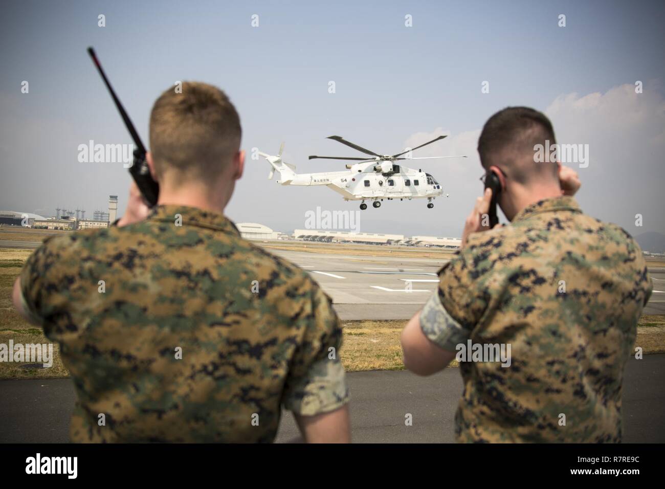 U.S. Marine Corps Lance Cpl. Daniel McGinness, left, and U.S. Marine ...