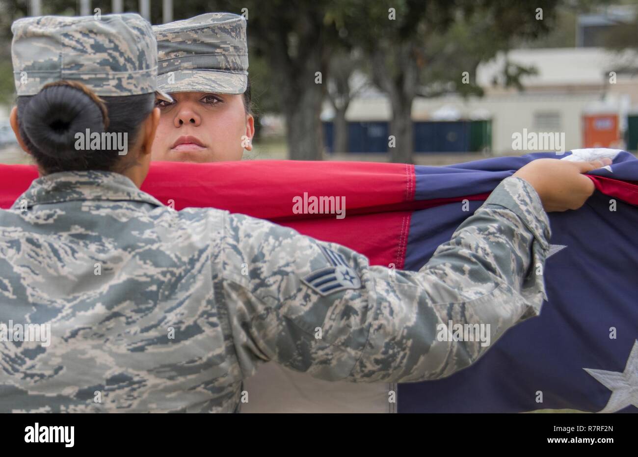 Jamela Shannon, 96th Medical Group, holds up the American flag during ...