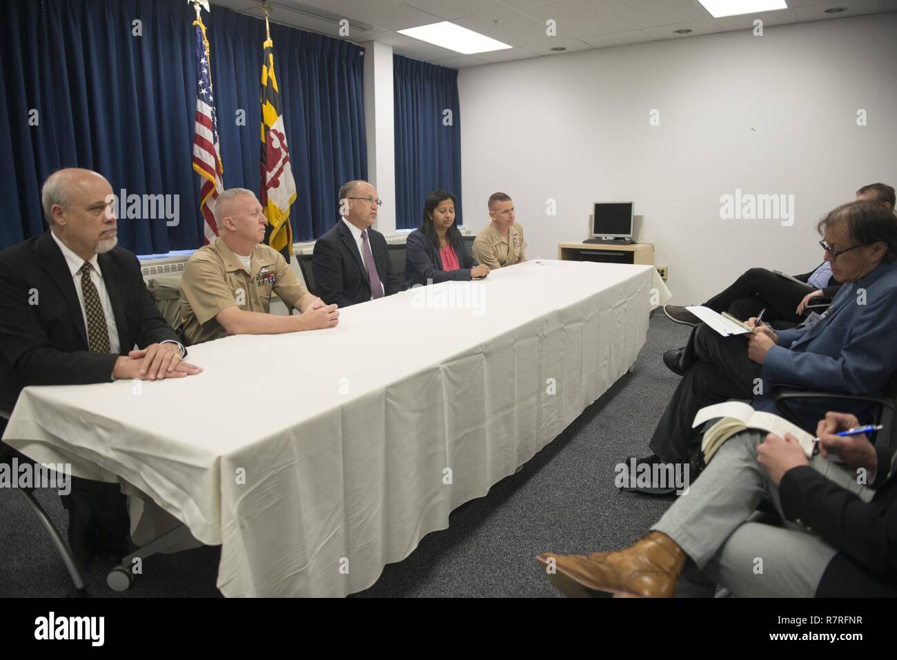 A panel discussion taking place at the Northrop Grumman facility during ...