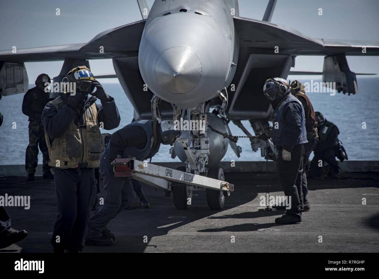 ATLANTIC OCEAN (March 30, 2017) Sailors prepare to secure an F/A-18E ...