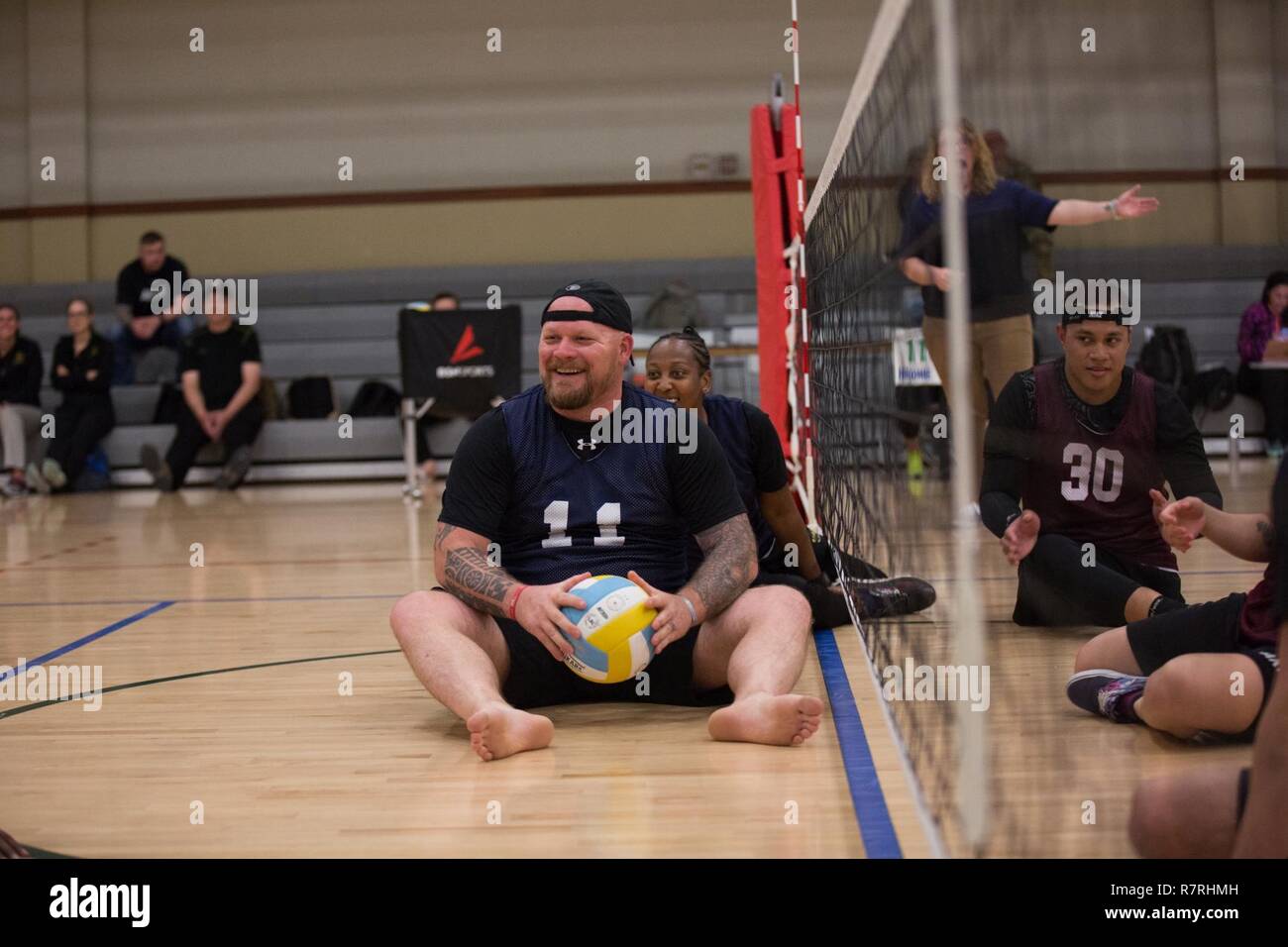 U.S. Army veteran, David Heaton, trains for the sitting volleyball ...