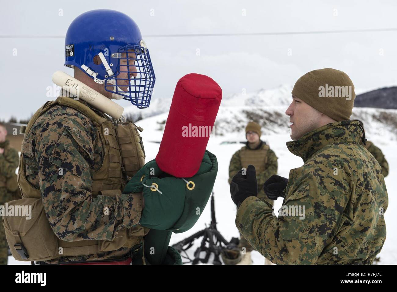 U.S. Marine Corps Sgt. William Worthy, right, coaches Lance Cpl. Joshua ...