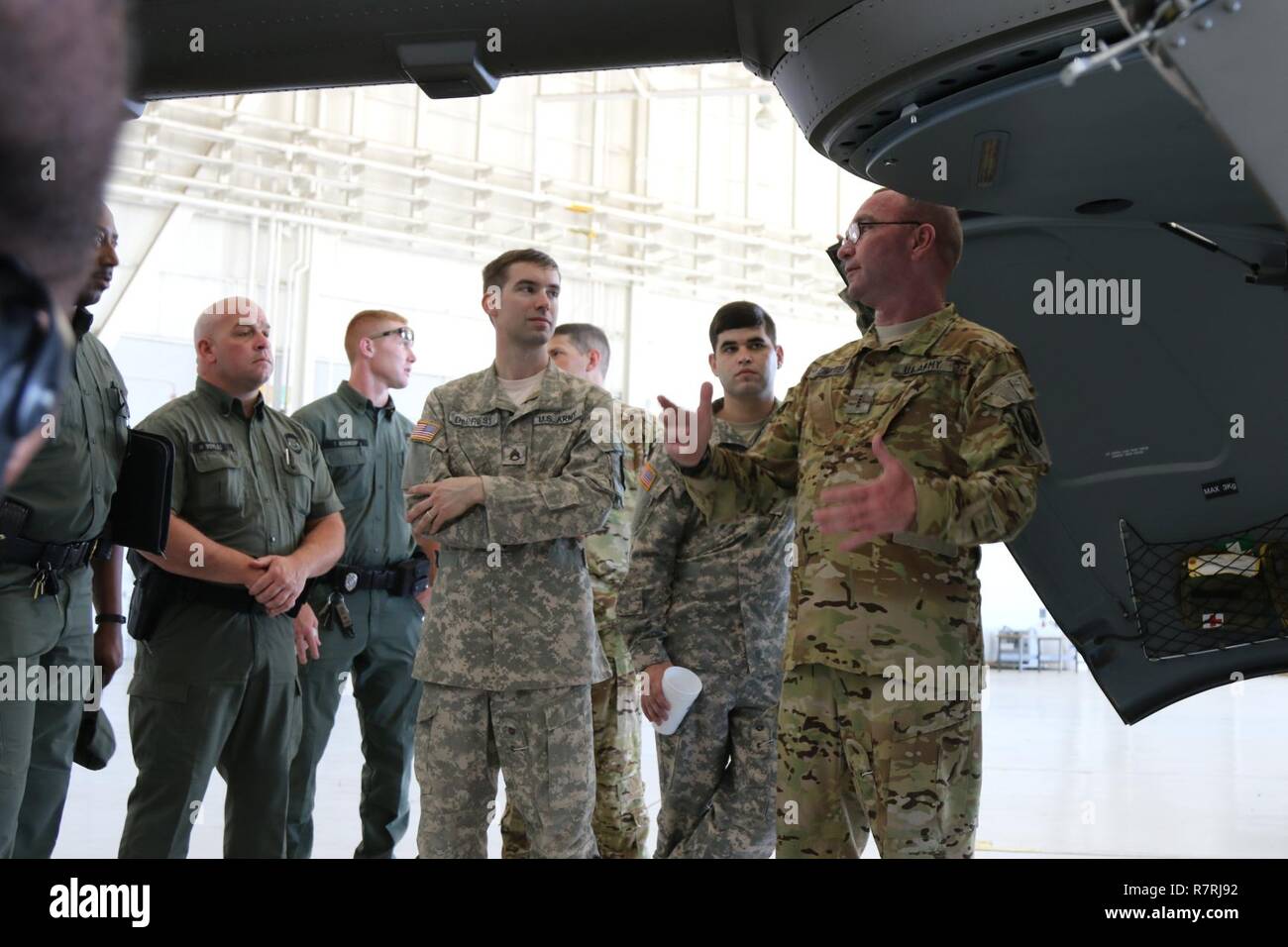 Chief Warrant Officers Bart Carter tells a group of wildlife and ...