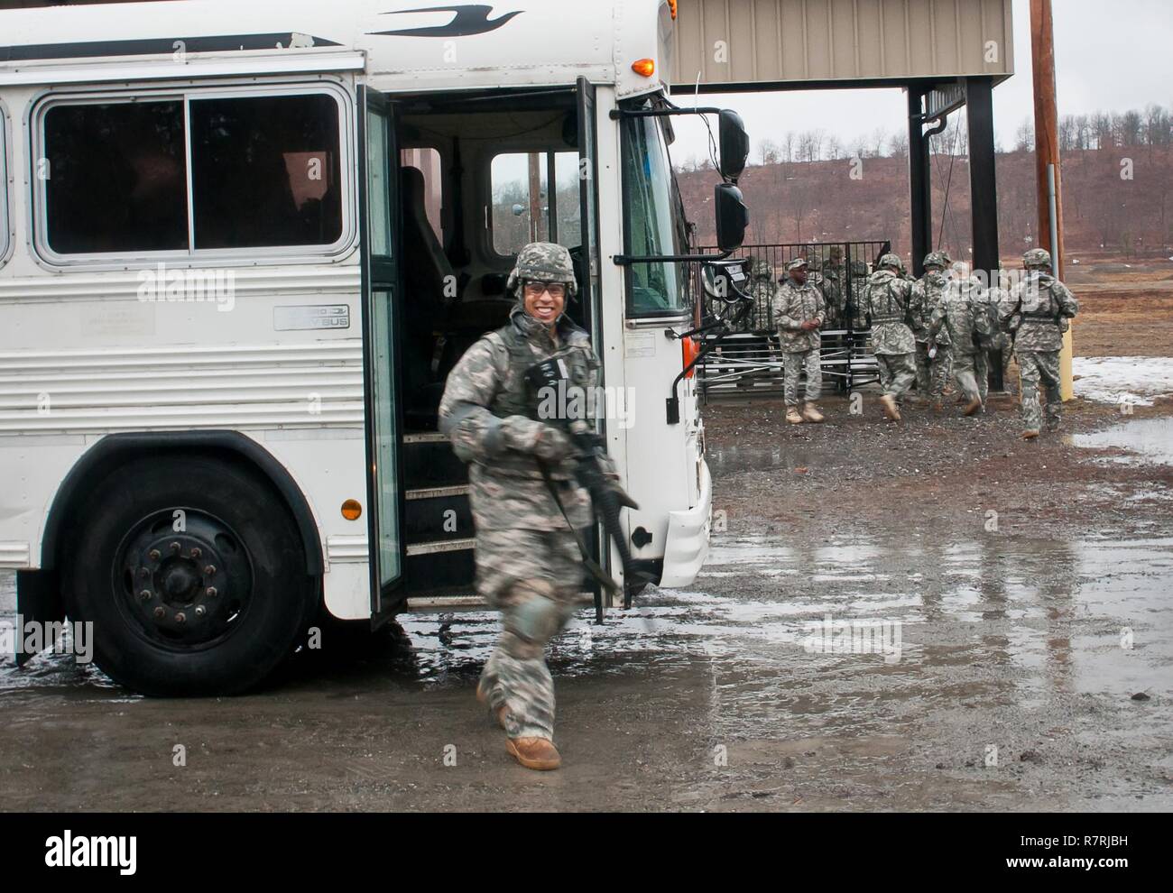 A Soldier excitedly exits the bus from the zero range to enter ...