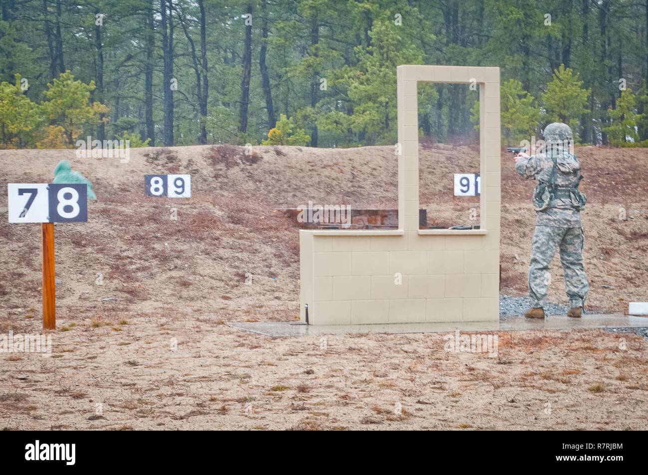 Soldier hits target during the marksmanship portion of the Best Warrior ...