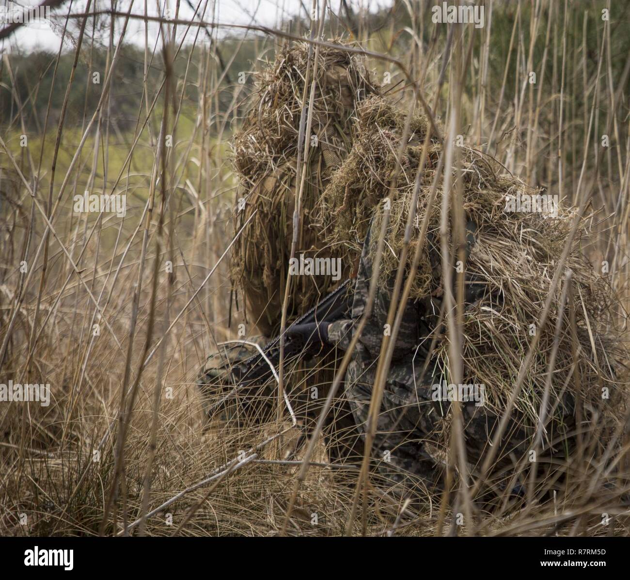 U.S. Marine Cpl. Alex Thill (left) and Republic of Korea Marine Staff ...