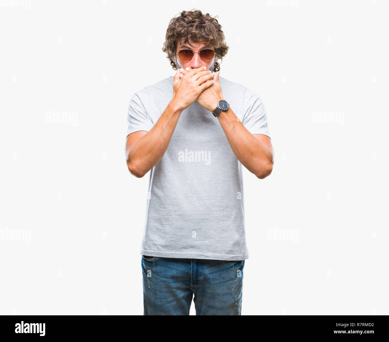 Handsome hispanic model man wearing sunglasses over isolated background ...