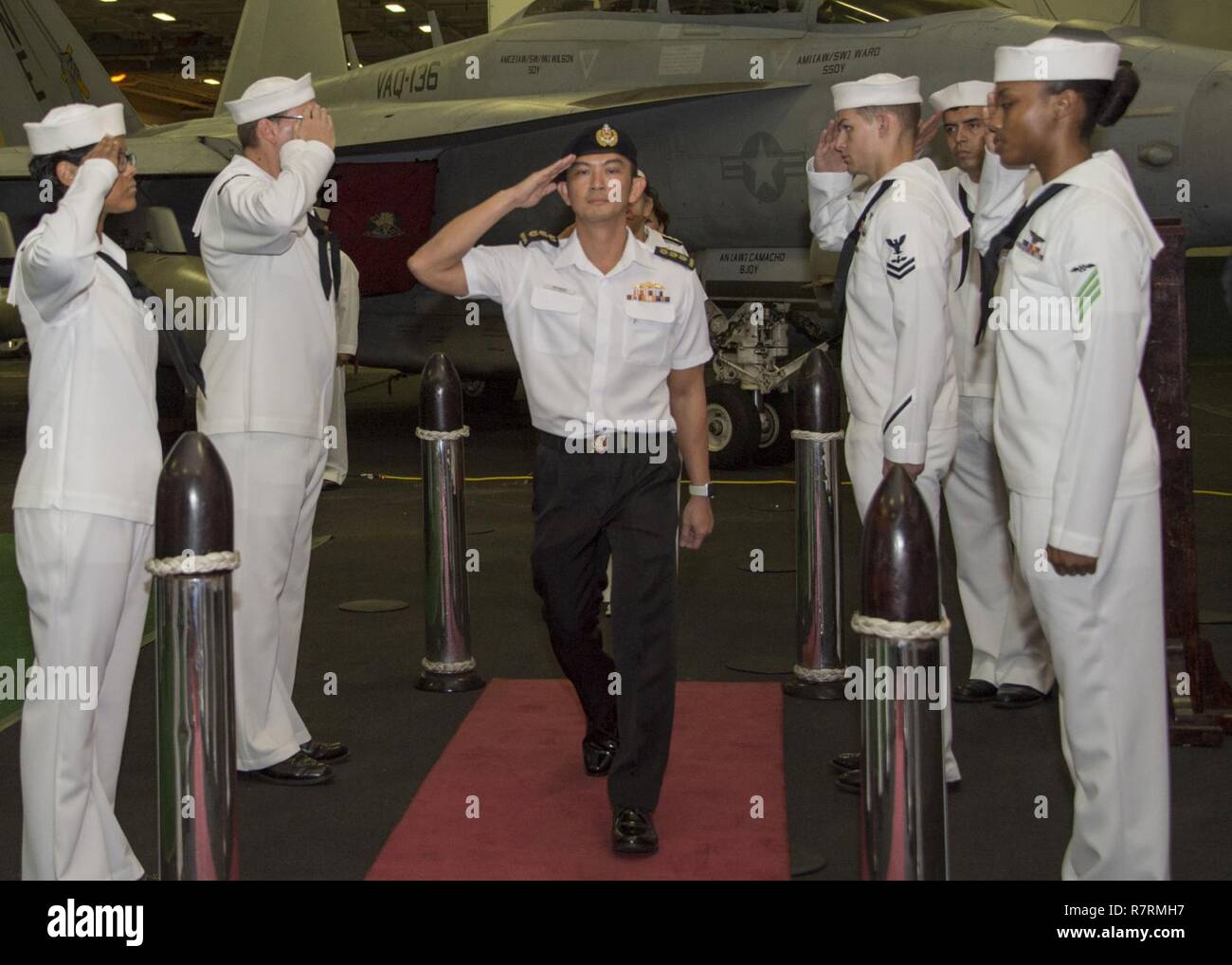 SINGAPORE (April 4, 2017) Sideboys render honors to Col. Cheong Kwok ...