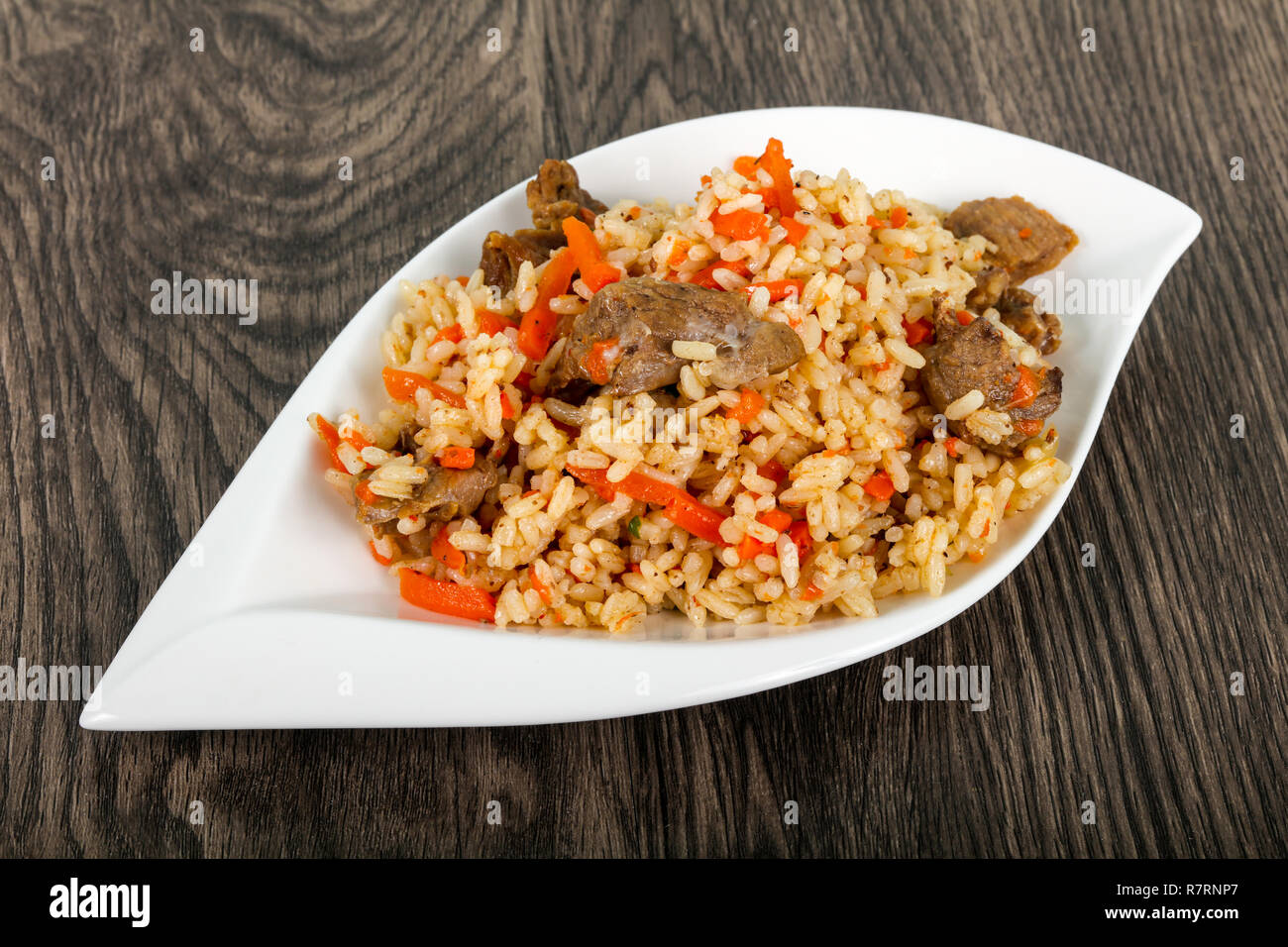 Asian rice - Plov with meat and carrot Stock Photo - Alamy