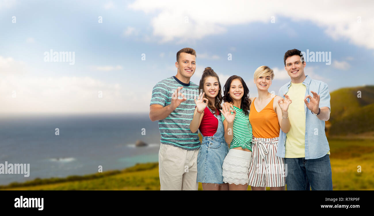 happy friends showing ok hand sign Stock Photo - Alamy