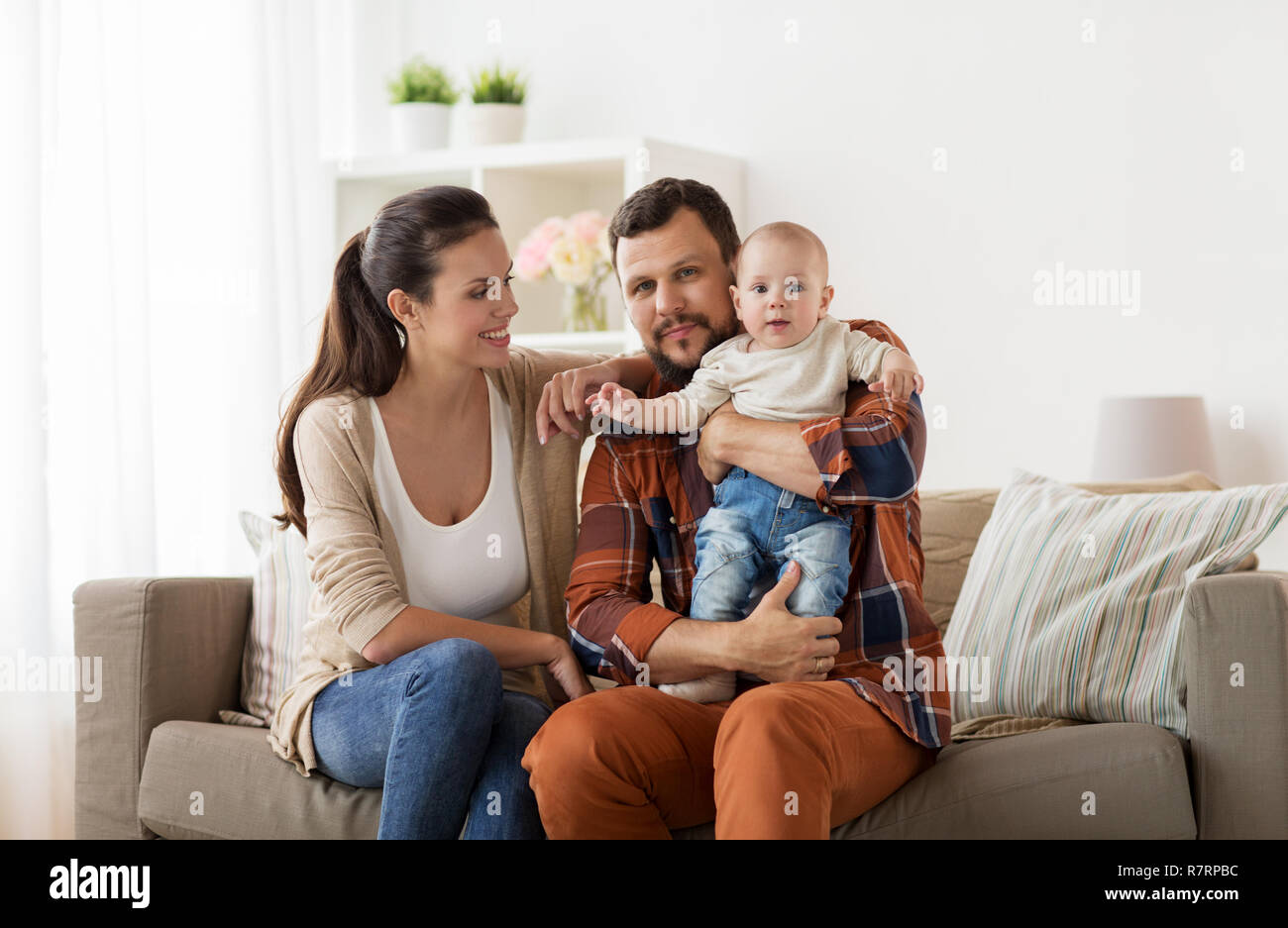 happy family with baby at home Stock Photo - Alamy