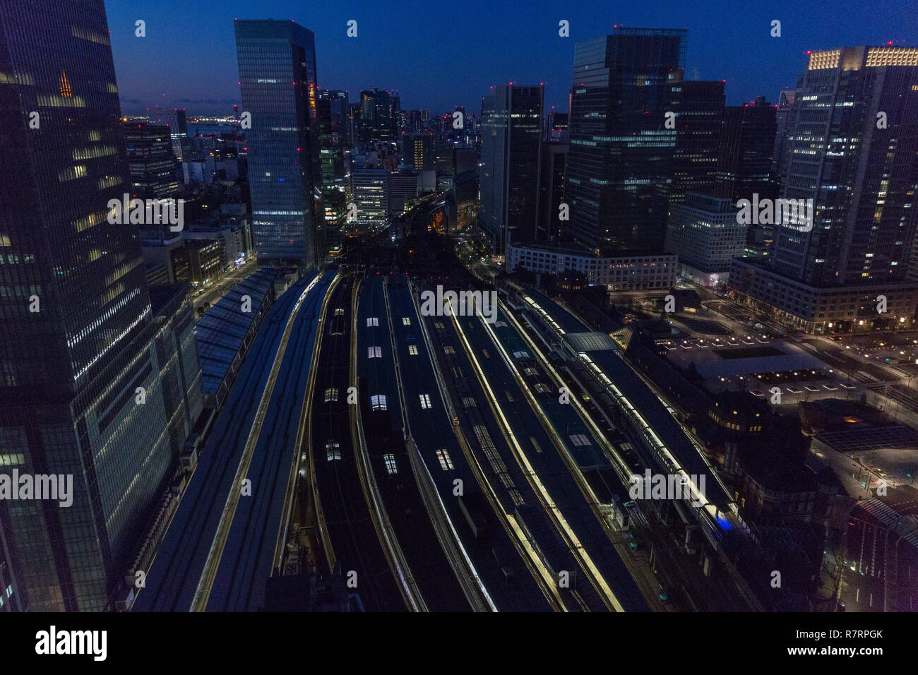 view of night railway station in tokyo city, japan Stock Photo - Alamy